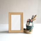 Free Small Frame with Figure Mockup - mockupbee