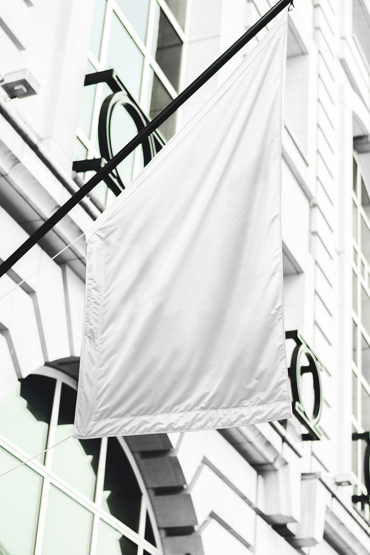 Free Asymmetrical Flag Mockup - mockupbee