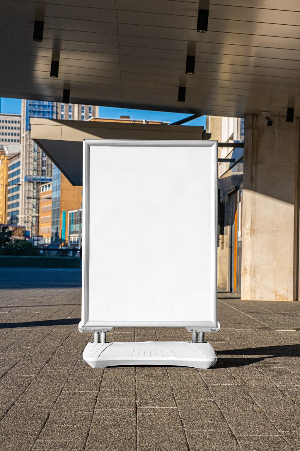 Free Street Poster Stand Mockup - mockupbee