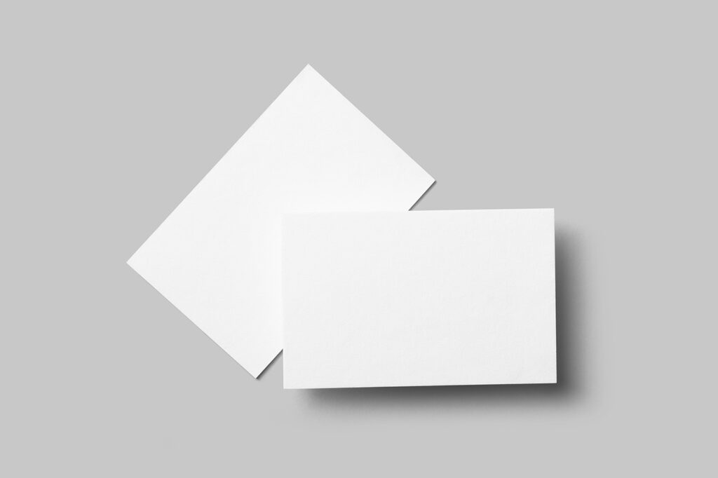 Free Business Card Top View Mockups - mockupbee